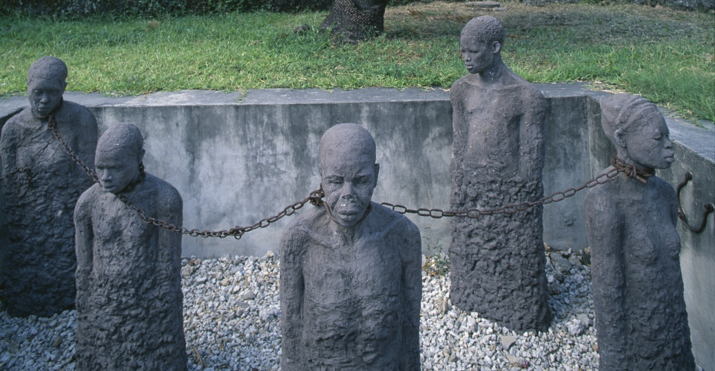 These statues of chained slaves in Tanzania stand as a memorial to the ...